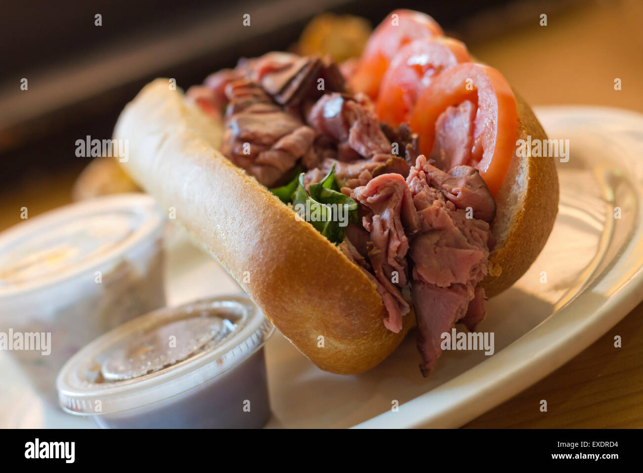 Roast beef on torpedo roll with tomato basil and fresh mozzarella ...