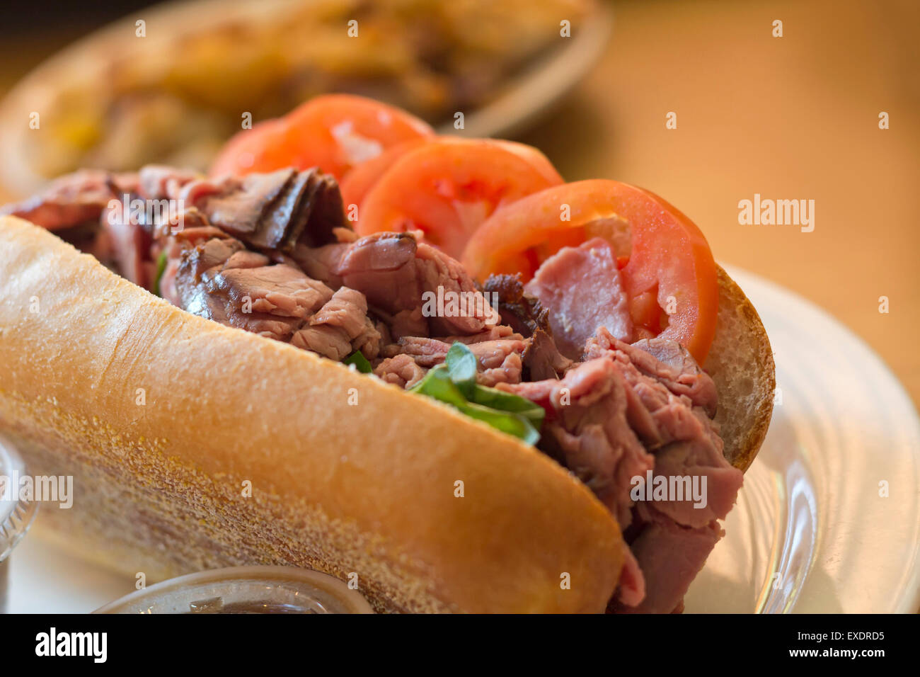 Roast beef on torpedo roll with tomato basil and fresh mozzarella ...
