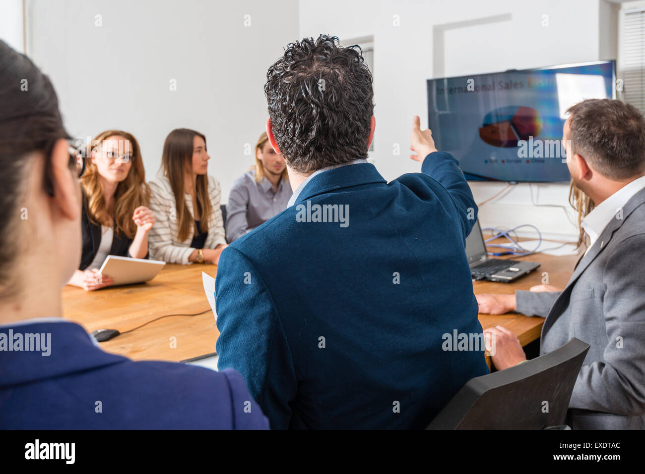 Discussion in business meeting Stock Photo - Alamy