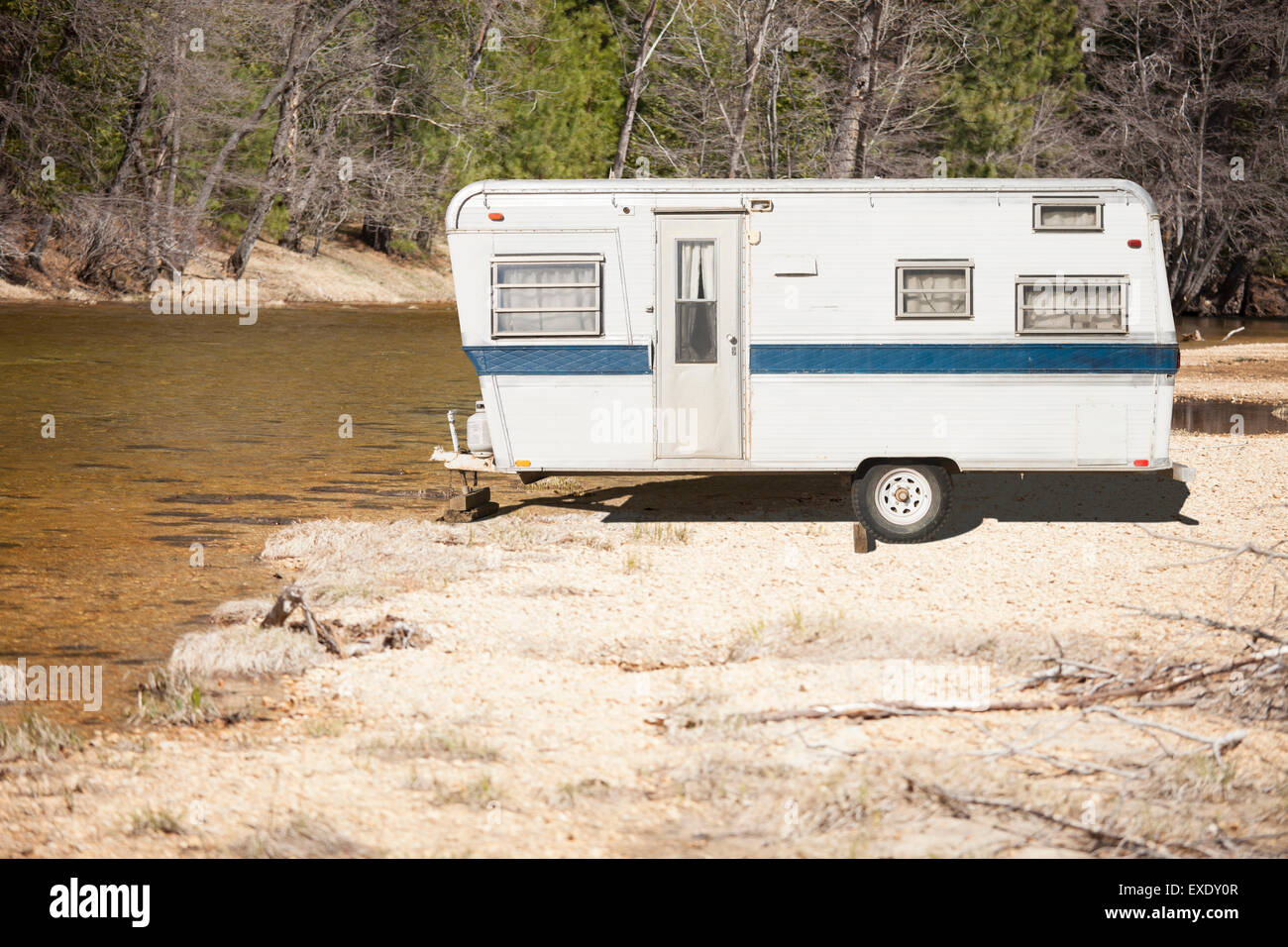 Classic Old Camper Trailer Near A Calm River Stock Photo - Alamy