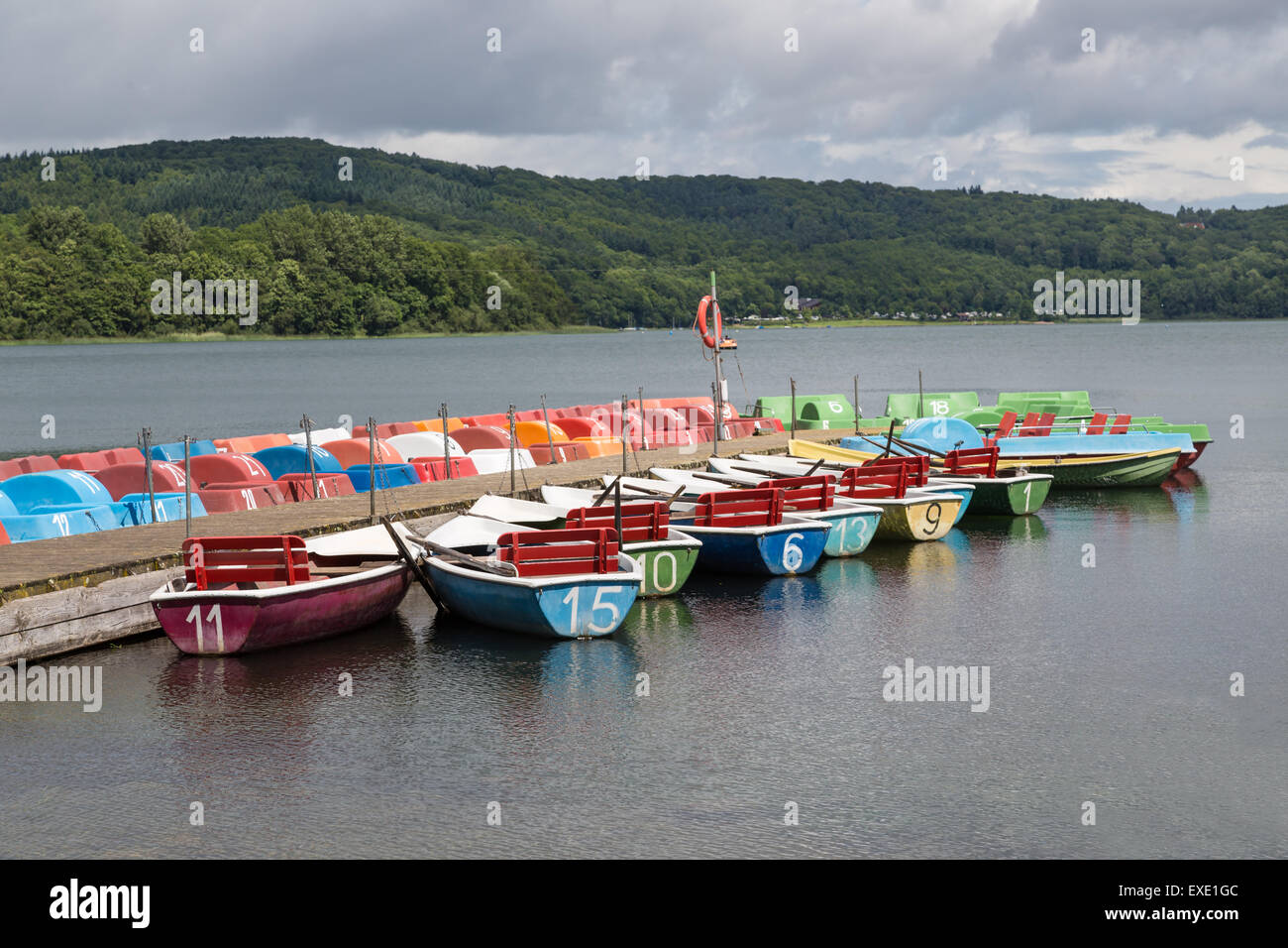 Colorful rowboats and pedalos for rental in a German lake Stock Photo ...