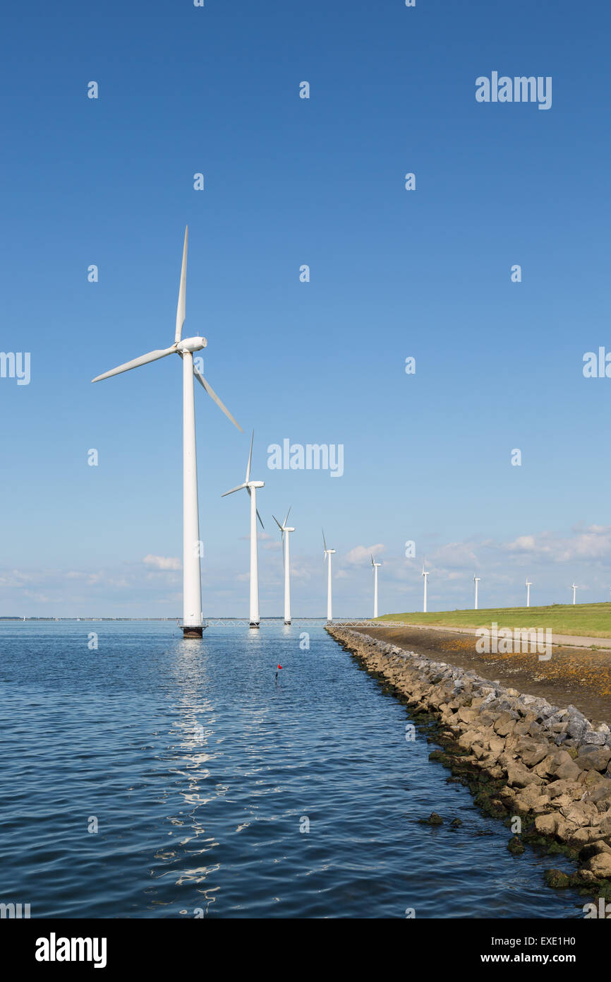 Long row off shore wind turbines along the Dutch coast Stock Photo - Alamy