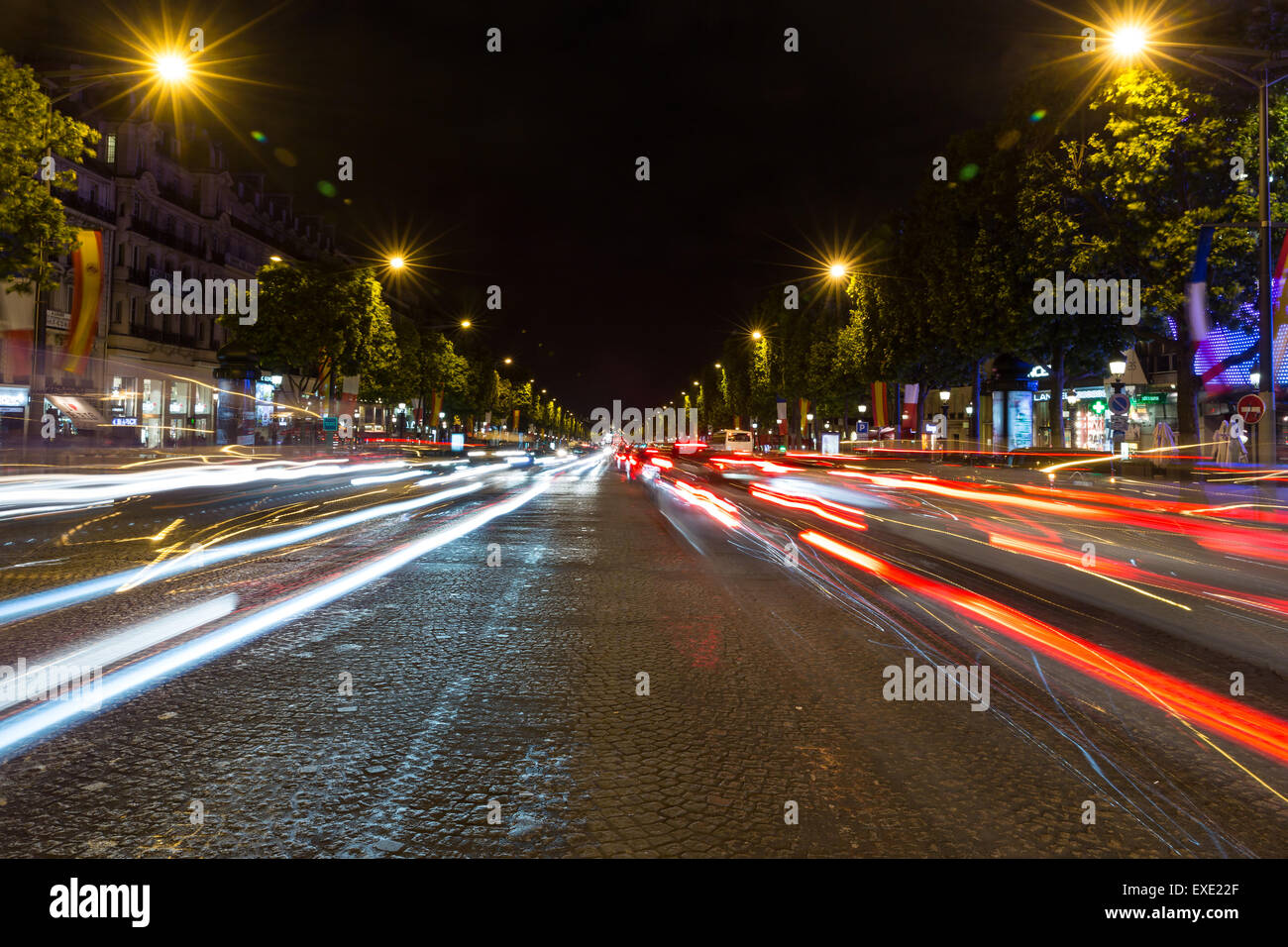 Evening streetview of famous Champs Elysees with illumination and ...
