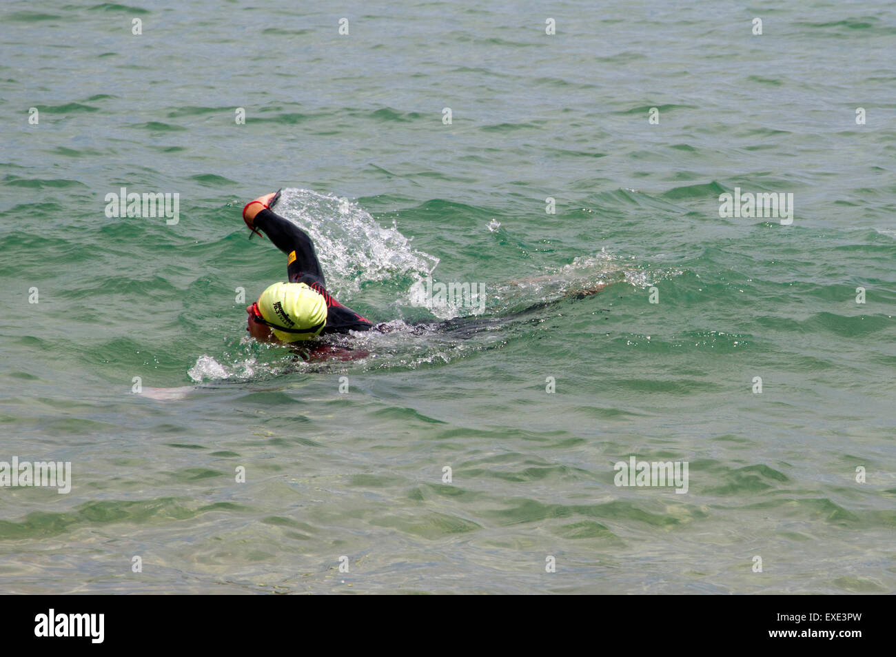 Sea swimmer swimming in the sea Stock Photo - Alamy