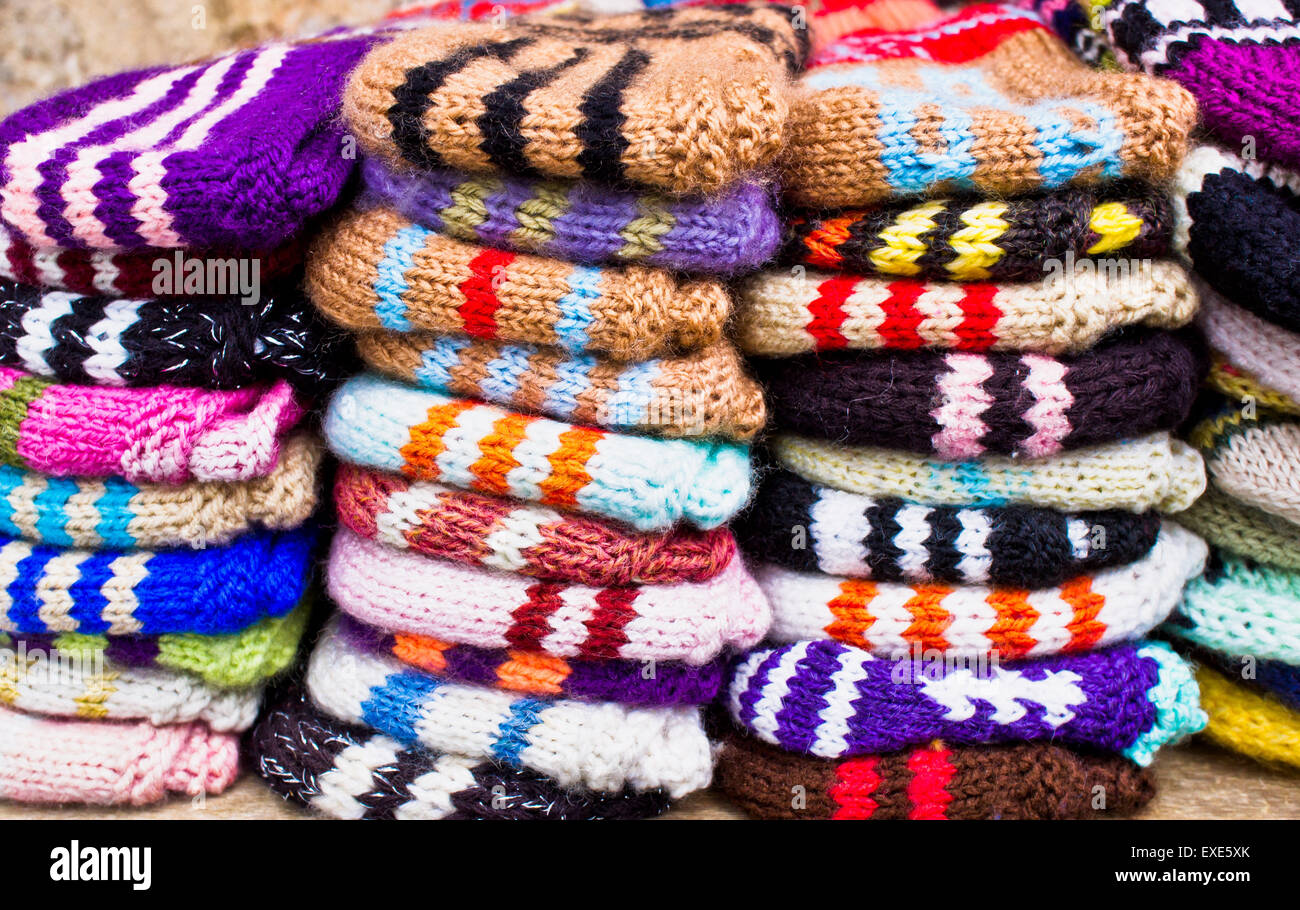 Stacks of colorful wool socks at a market Stock Photo - Alamy
