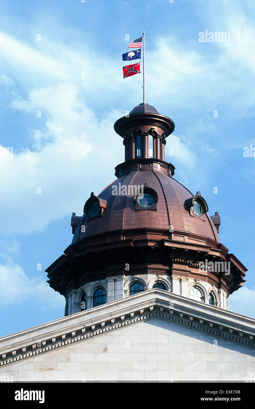 The Confederate Battle Flag flying over the state capitol building in ...
