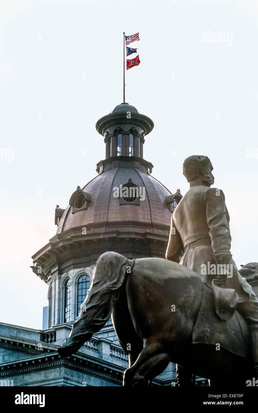 The Confederate Battle Flag flying over the state capitol building in ...