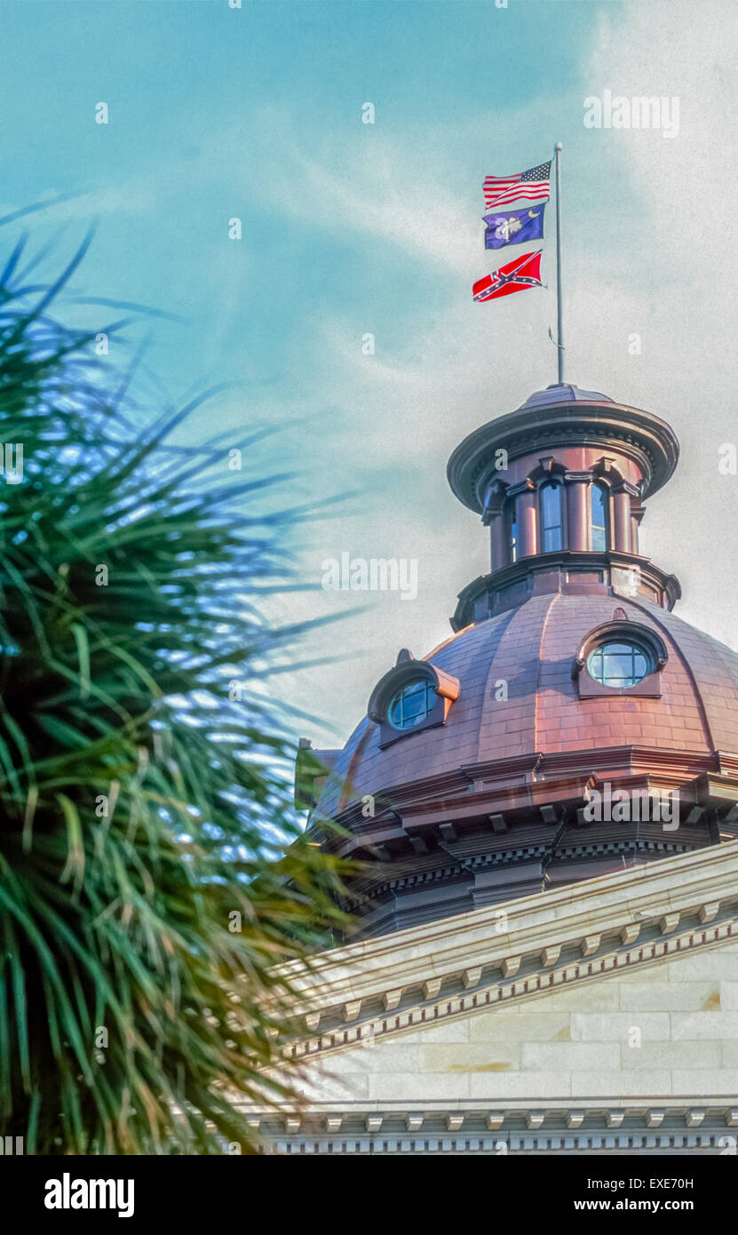 The Confederate Battle Flag flying over the state capitol building in ...