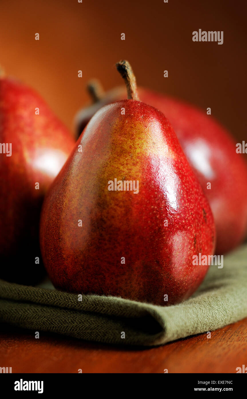 Red Anjou pears on green cloth Stock Photo - Alamy