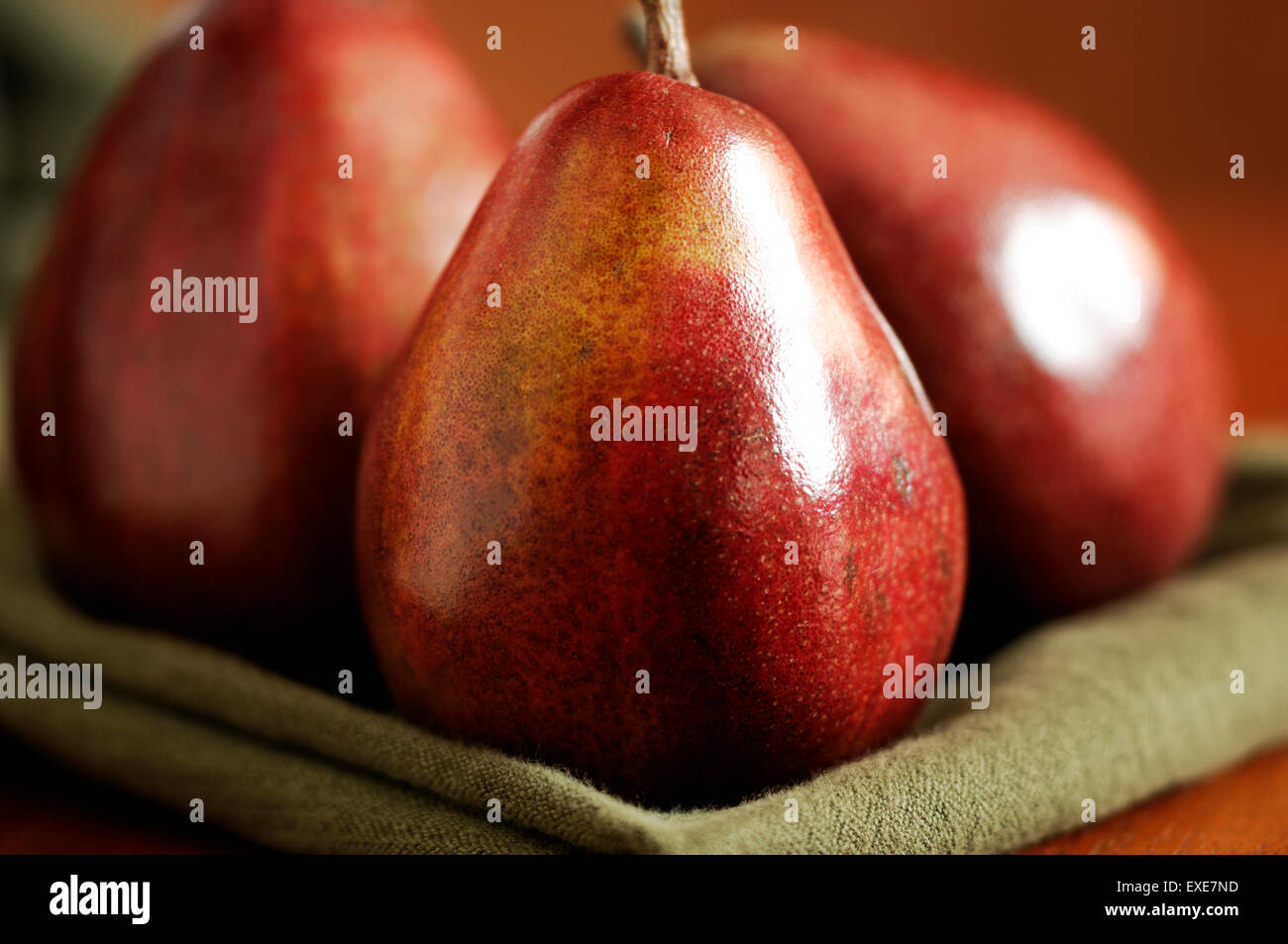 Red Anjou pears on green cloth Stock Photo - Alamy