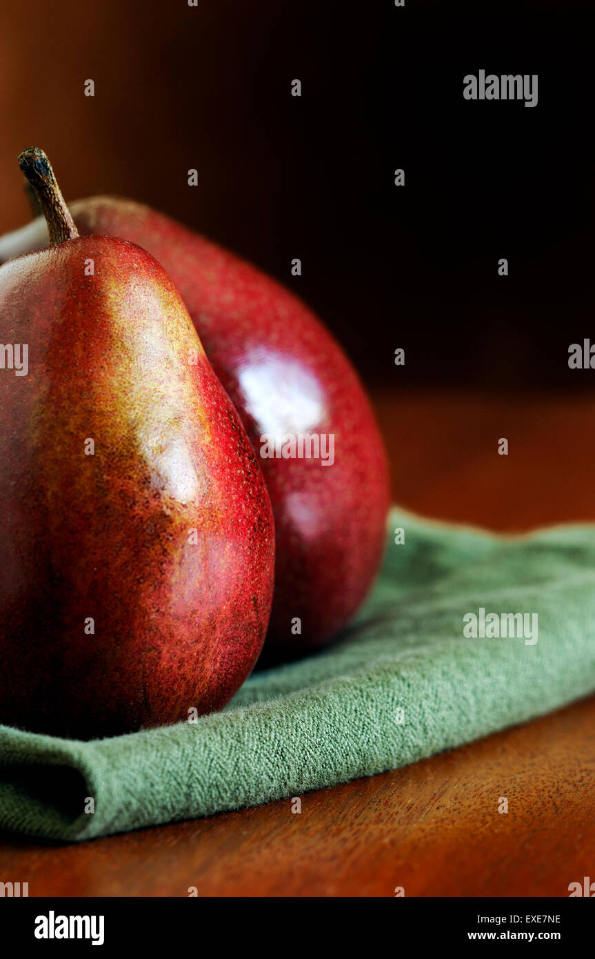Red Anjou pears on green cloth Stock Photo - Alamy