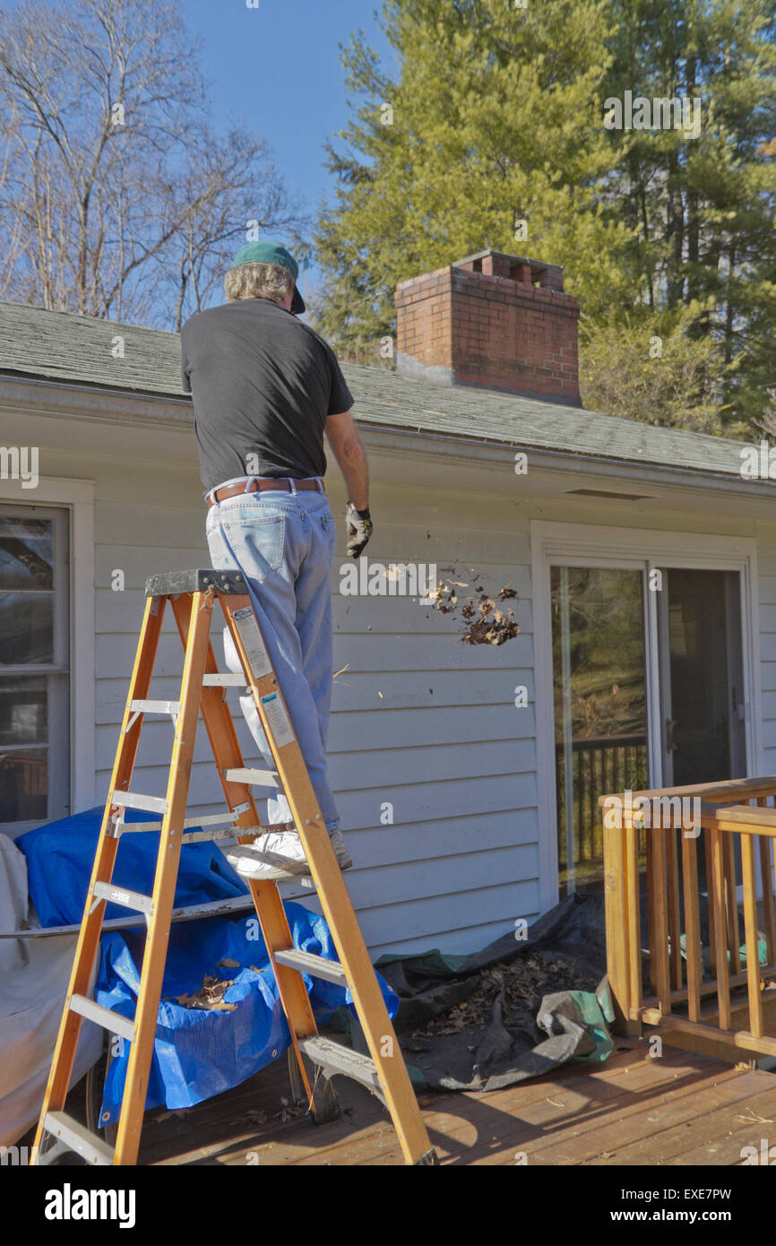 Man up ladder hi-res stock photography and images - Alamy