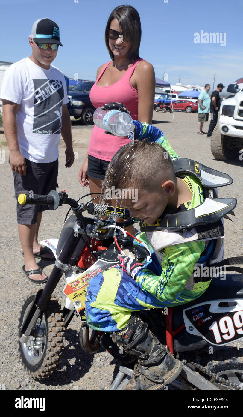 Usa. 12th July, 2015. SPORTS -- Tim Lawson and wife, Kira Beamon watch ...