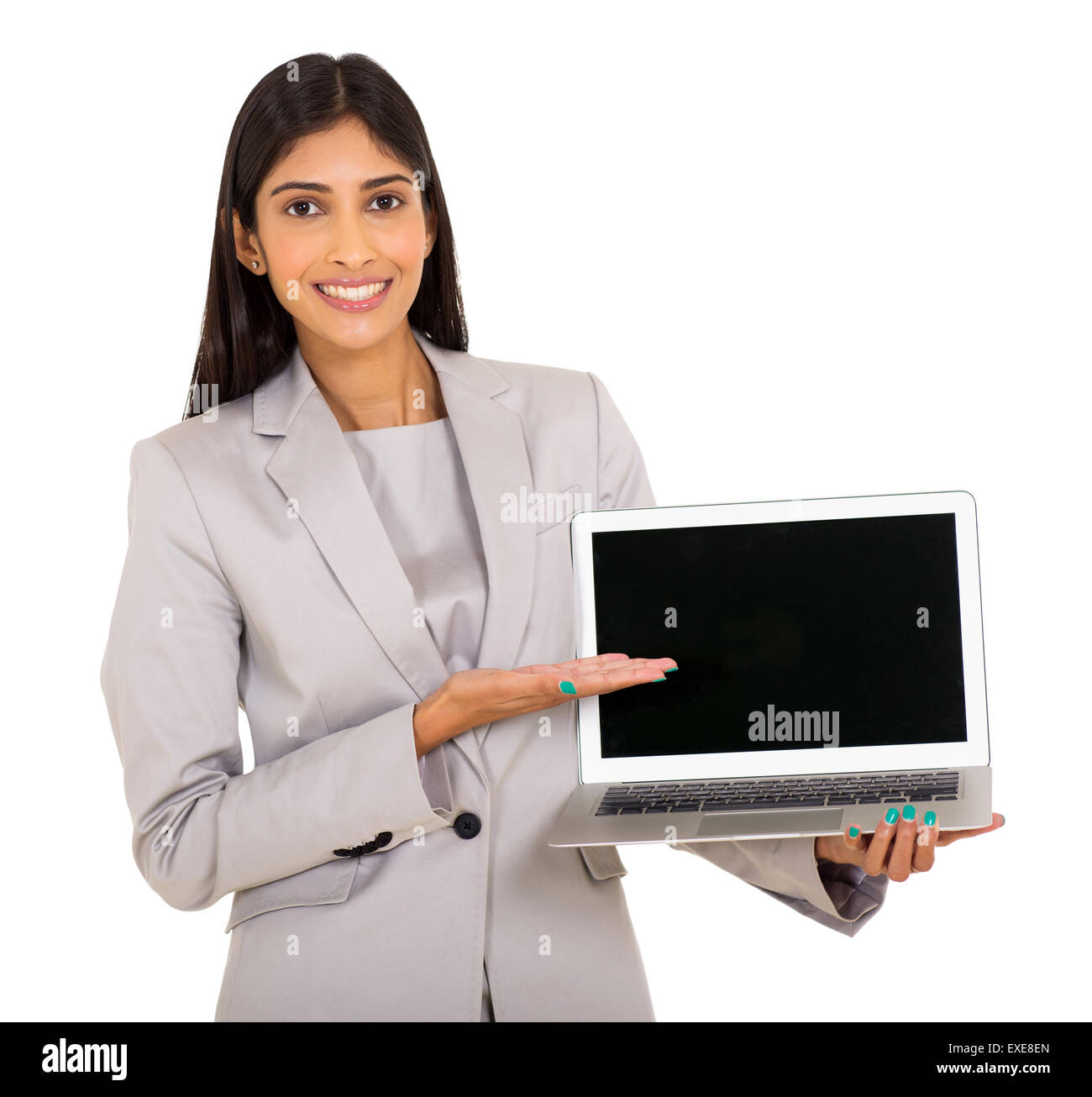 portrait of attractive young business woman presenting laptop computer ...