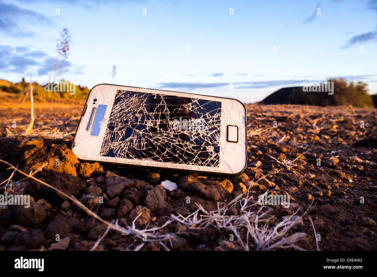 White Smartphone with Broken Display Stock Photo - Alamy