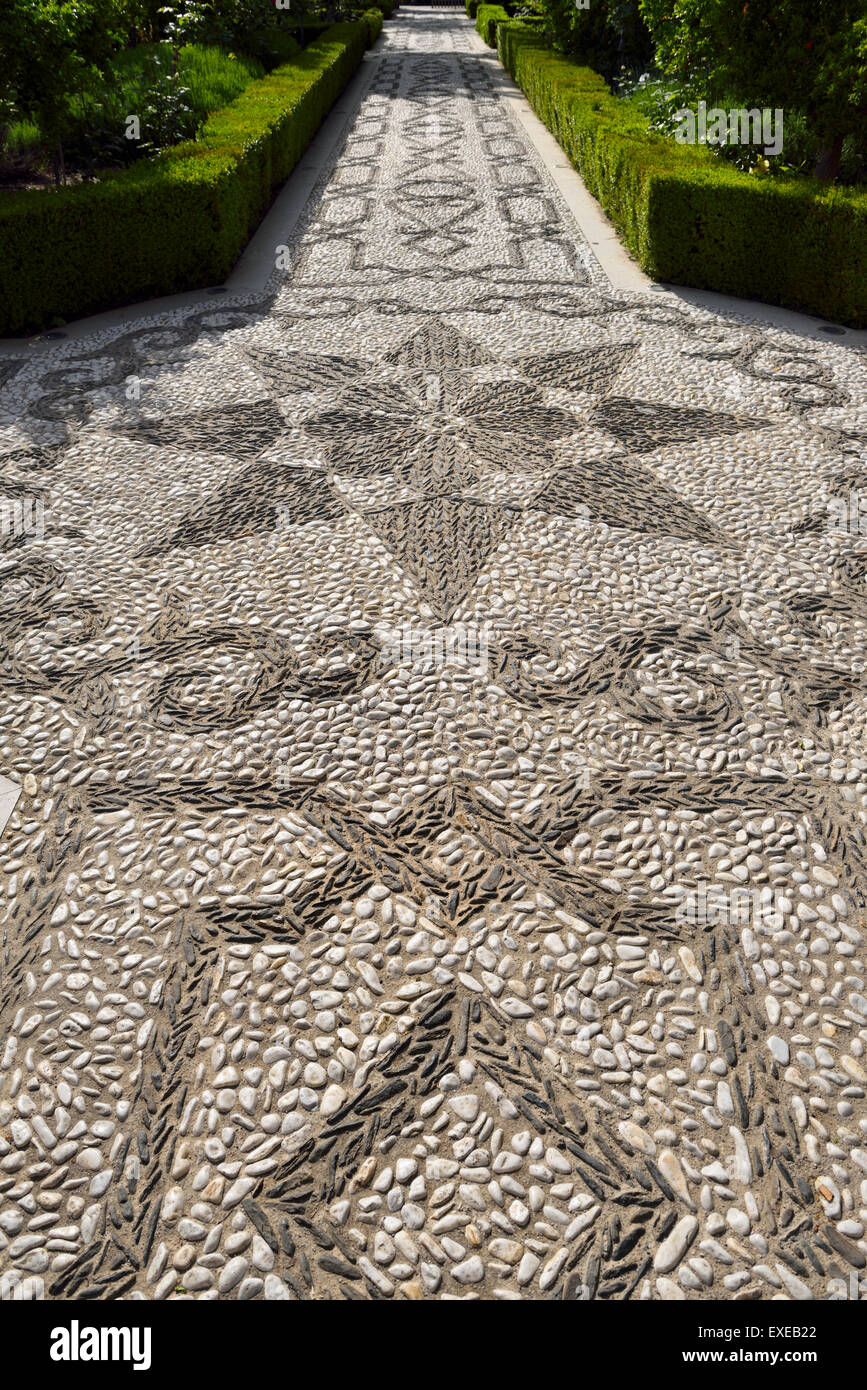 Stone pattern in garden walkway of San Francisco convent at Alhambra ...