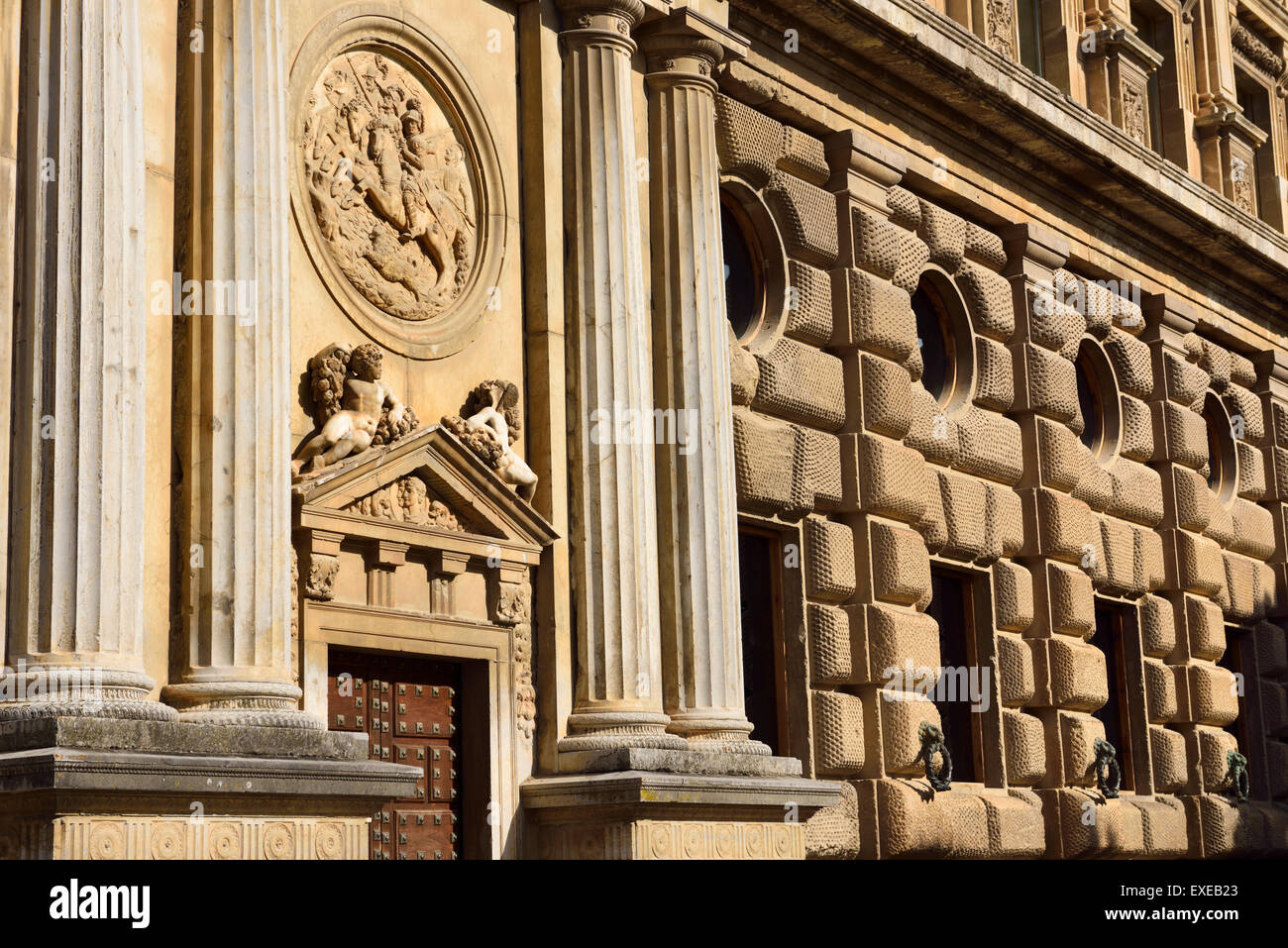 West door with columns and rustication blocks of the Palace of Charles ...