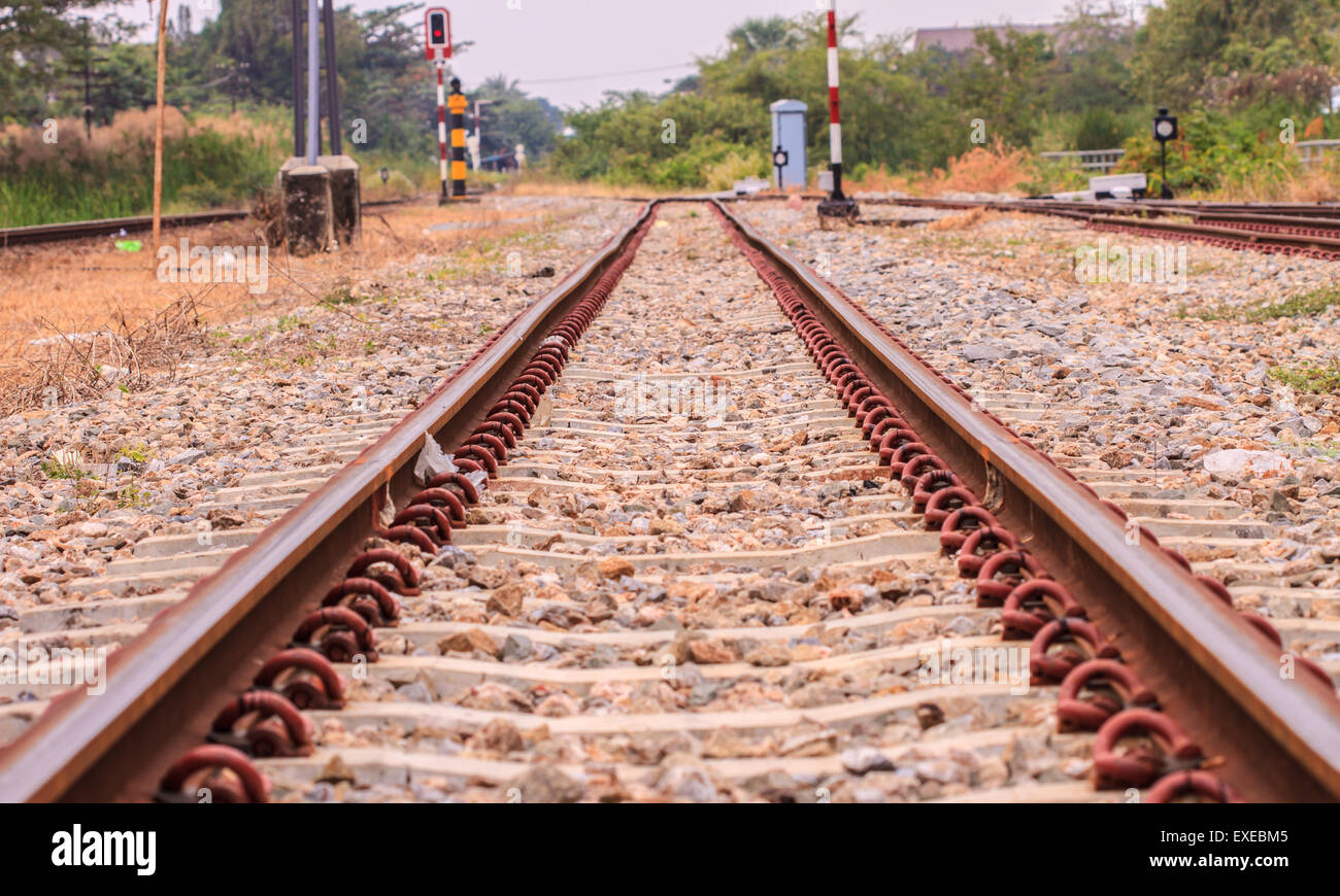 Close up of empty straight railroad track Stock Photo - Alamy