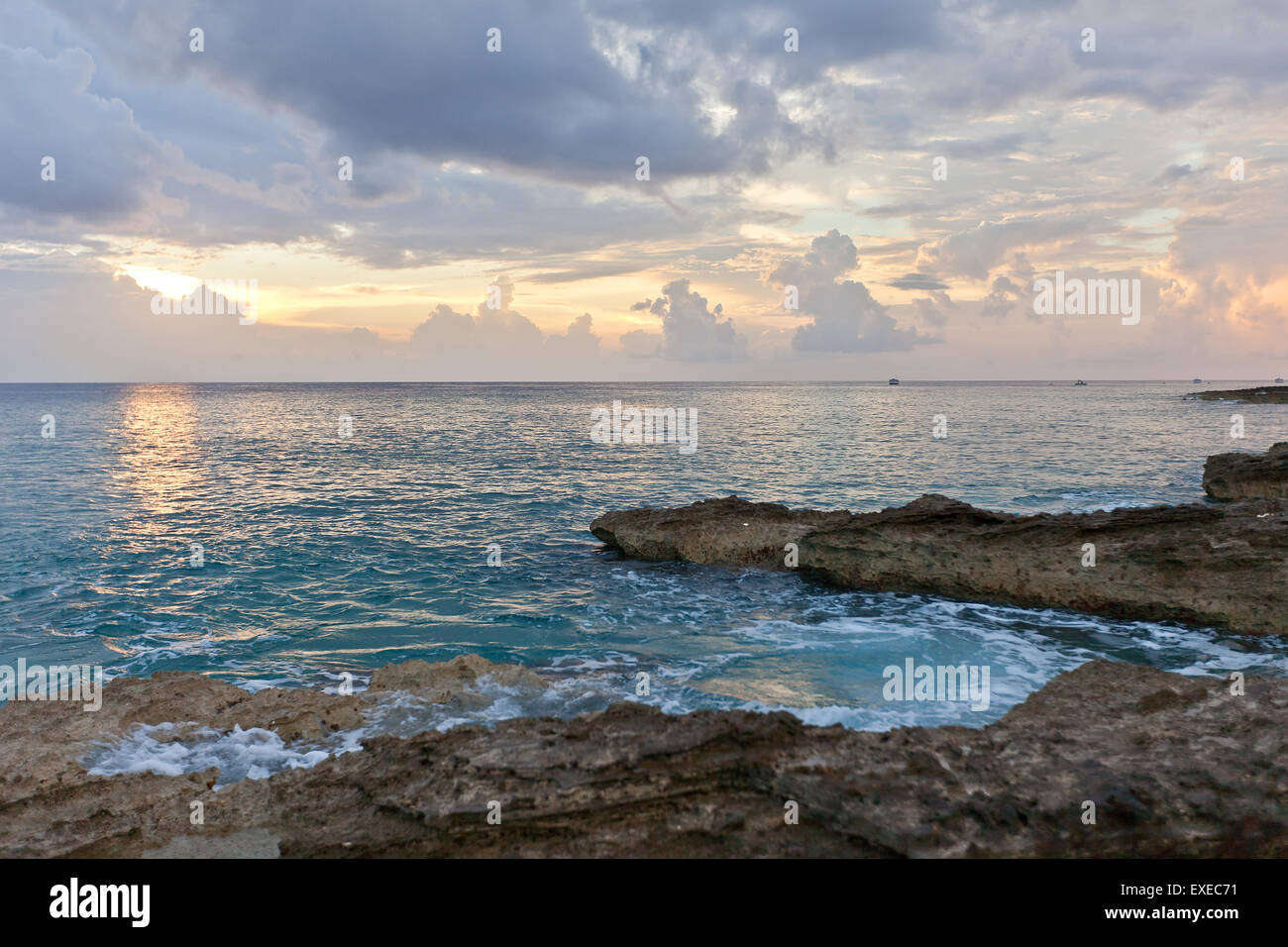 Summer sunset on the seashore of Grand Cayman Island, Cayman Islands ...