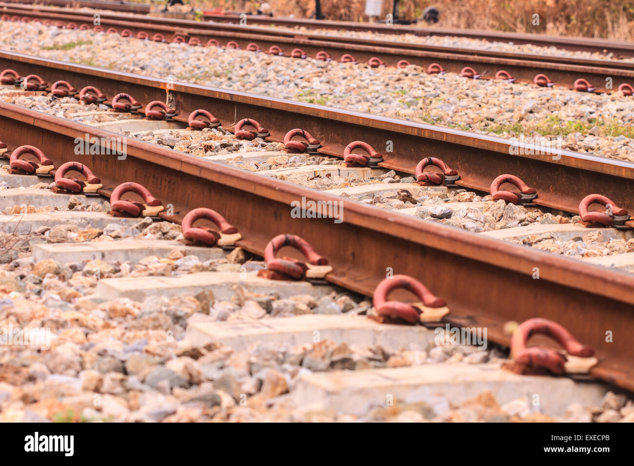 Close up of empty straight railroad track Stock Photo - Alamy