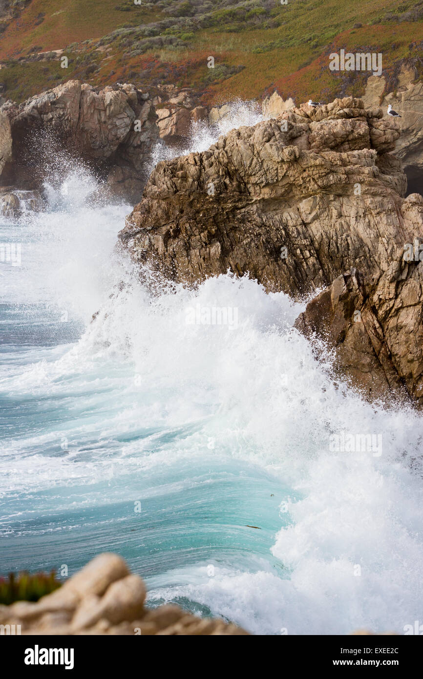 large rocks and powerful waves in a dramatic display classic of the ...