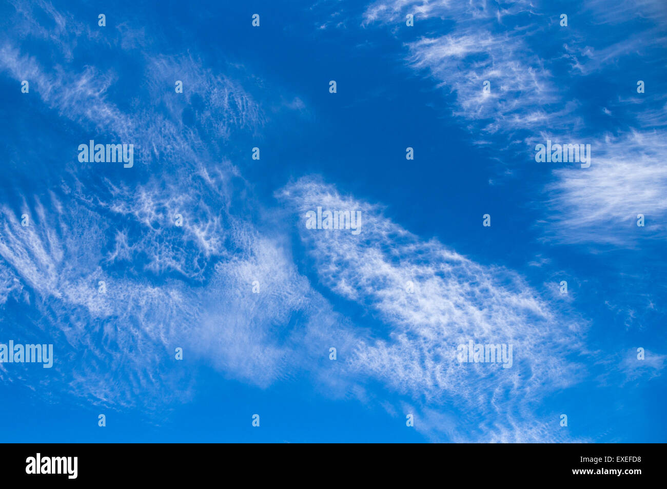 Blue sky and cirrus and stratus clouds background Stock Photo - Alamy