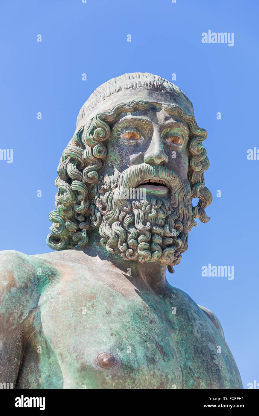 Portrait of Riace's Bronze copy of statue A. blue sky background Stock ...