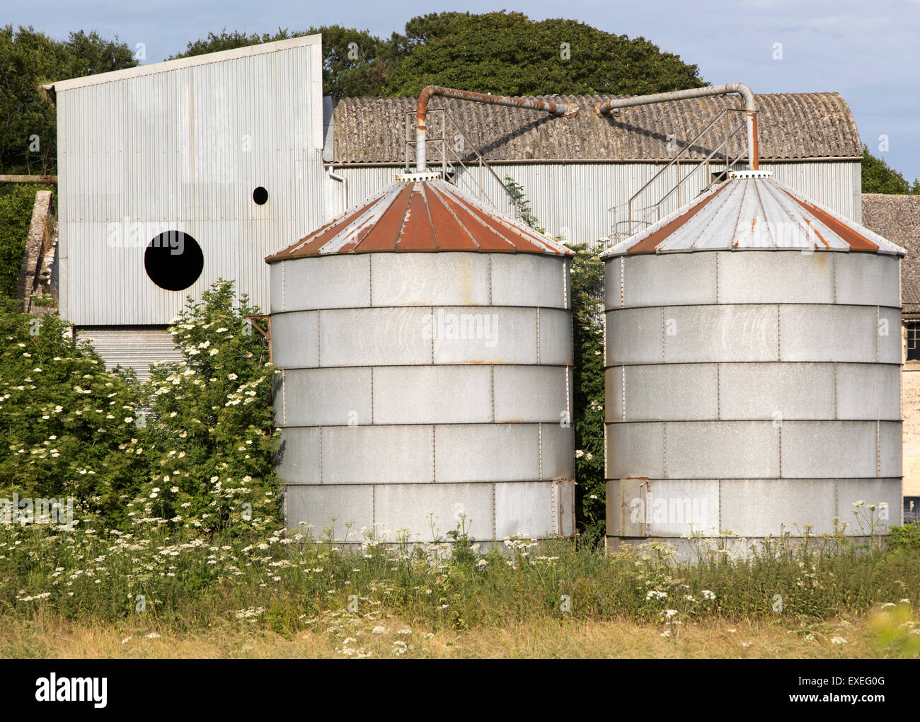 Old steel storage tanks and barns, West Kennet, Wiltshire, England, UK ...