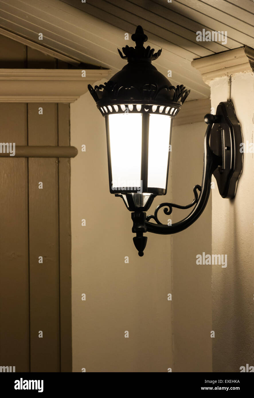 Single lantern in front of the European style house Stock Photo - Alamy