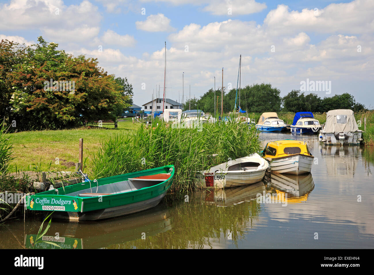 A view of boats and dinghies moored in a small dyke off the River ...