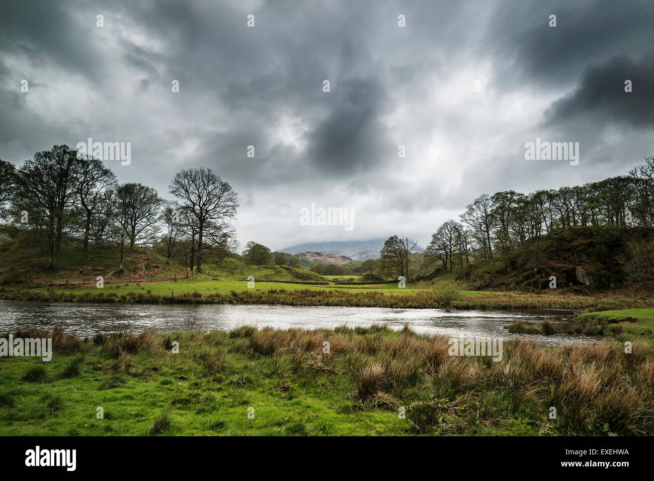 Stormy dramatic sky over Lake District landscape in England Stock Photo ...