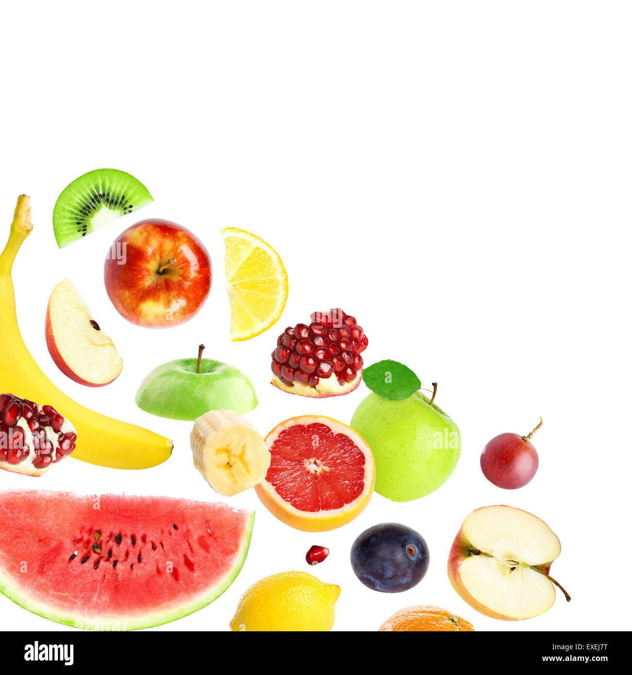 Falling fresh fruits and berries on white background Stock Photo - Alamy
