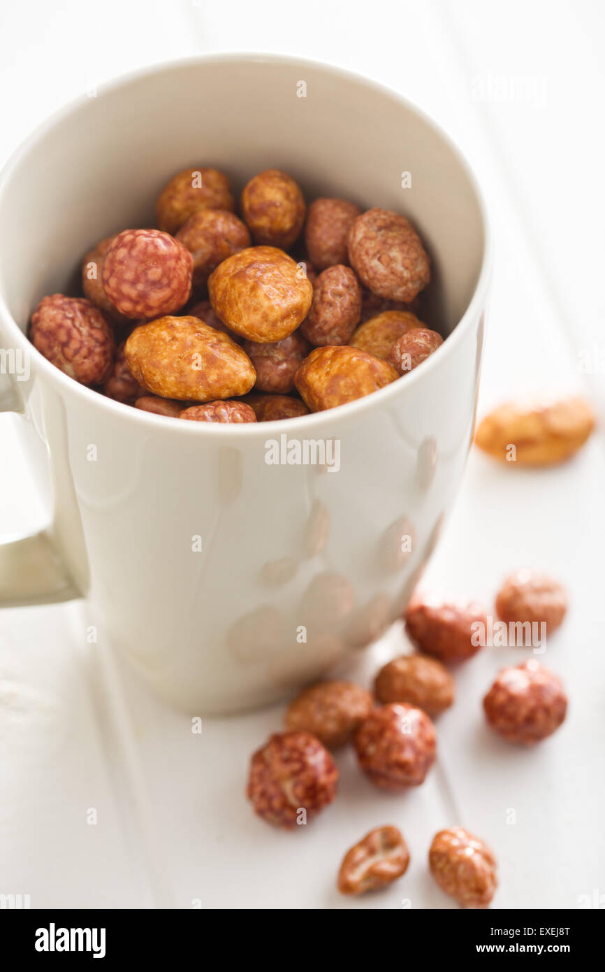 various sugared nuts in cup Stock Photo - Alamy