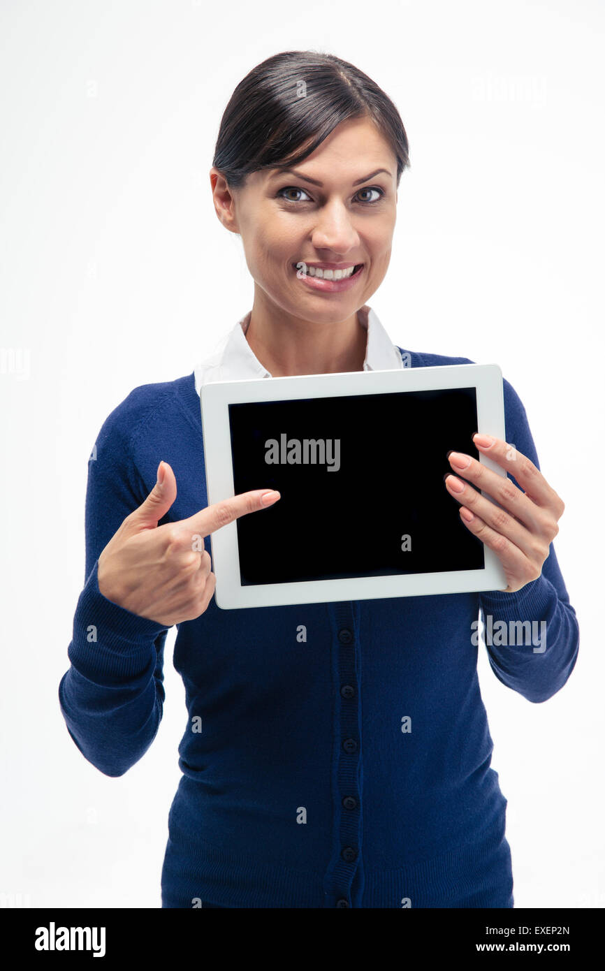 Smiling businesswoman pointing finger on tablet computer screen ...