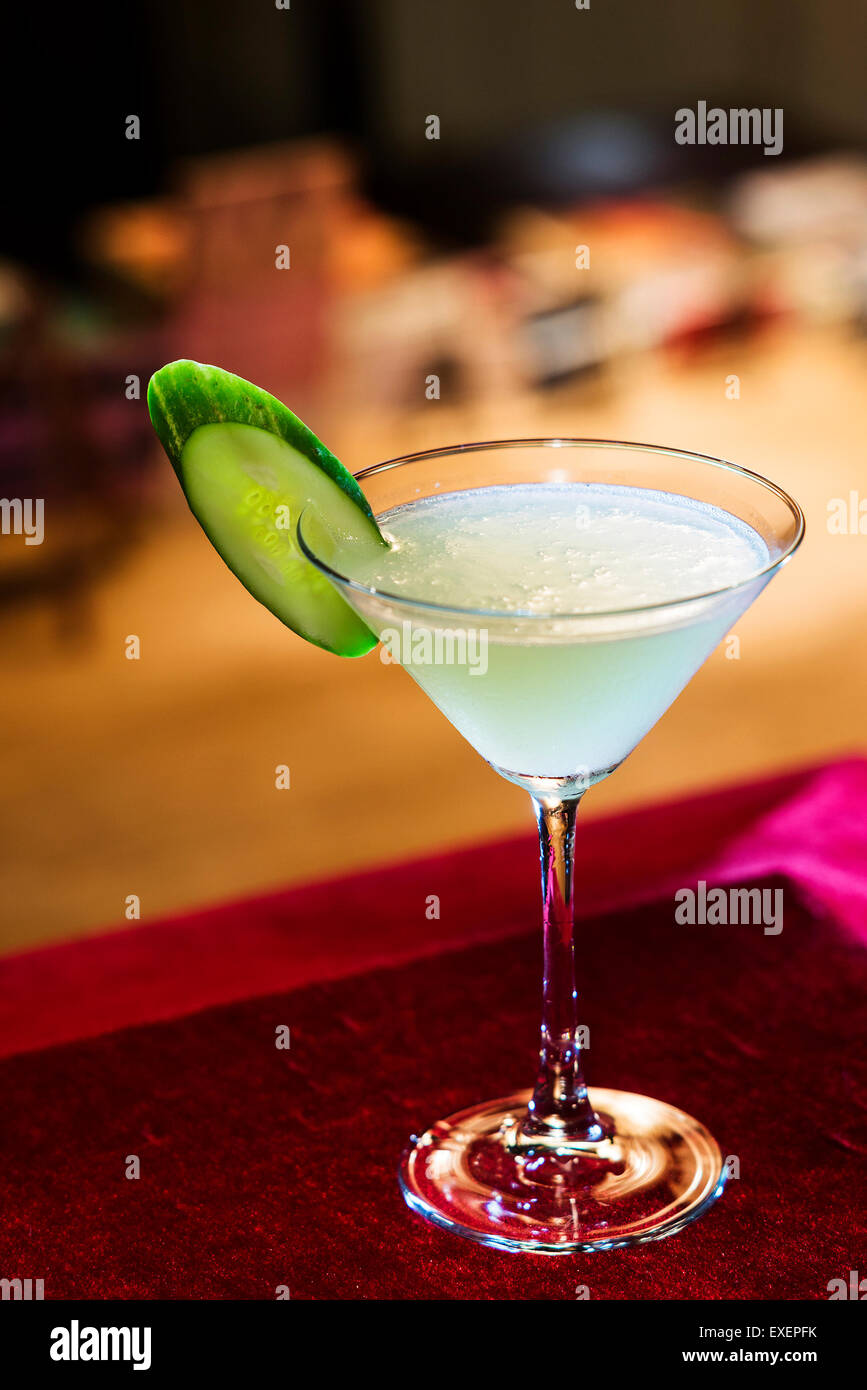modern blue martini cocktail with lime in bar Stock Photo - Alamy