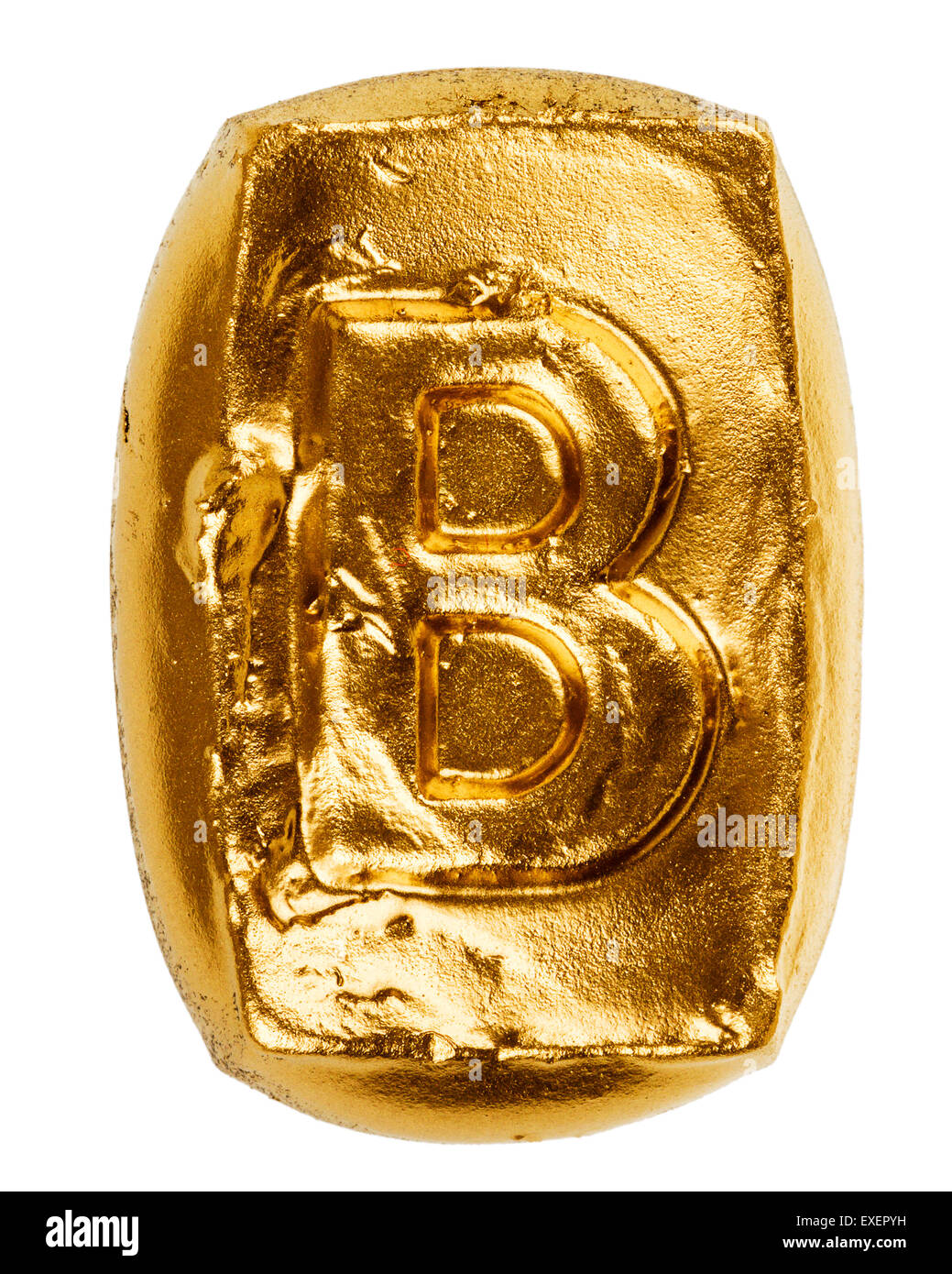 Handmade ceramic letter painted in gold cutout on white background ...