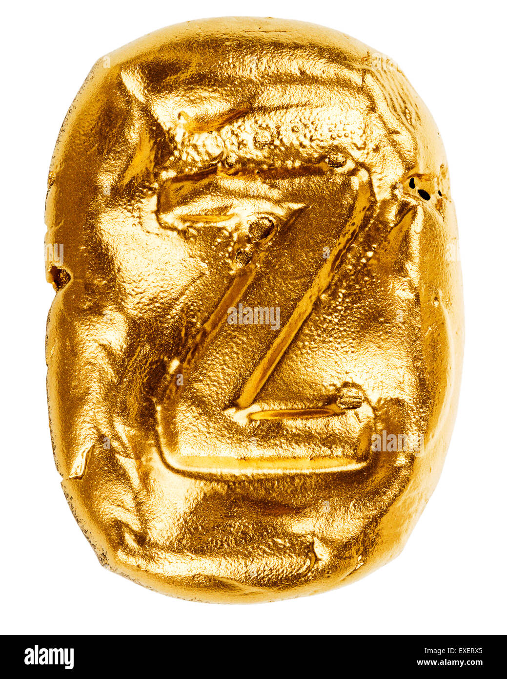 Handmade ceramic letter painted in gold cutout on white background ...