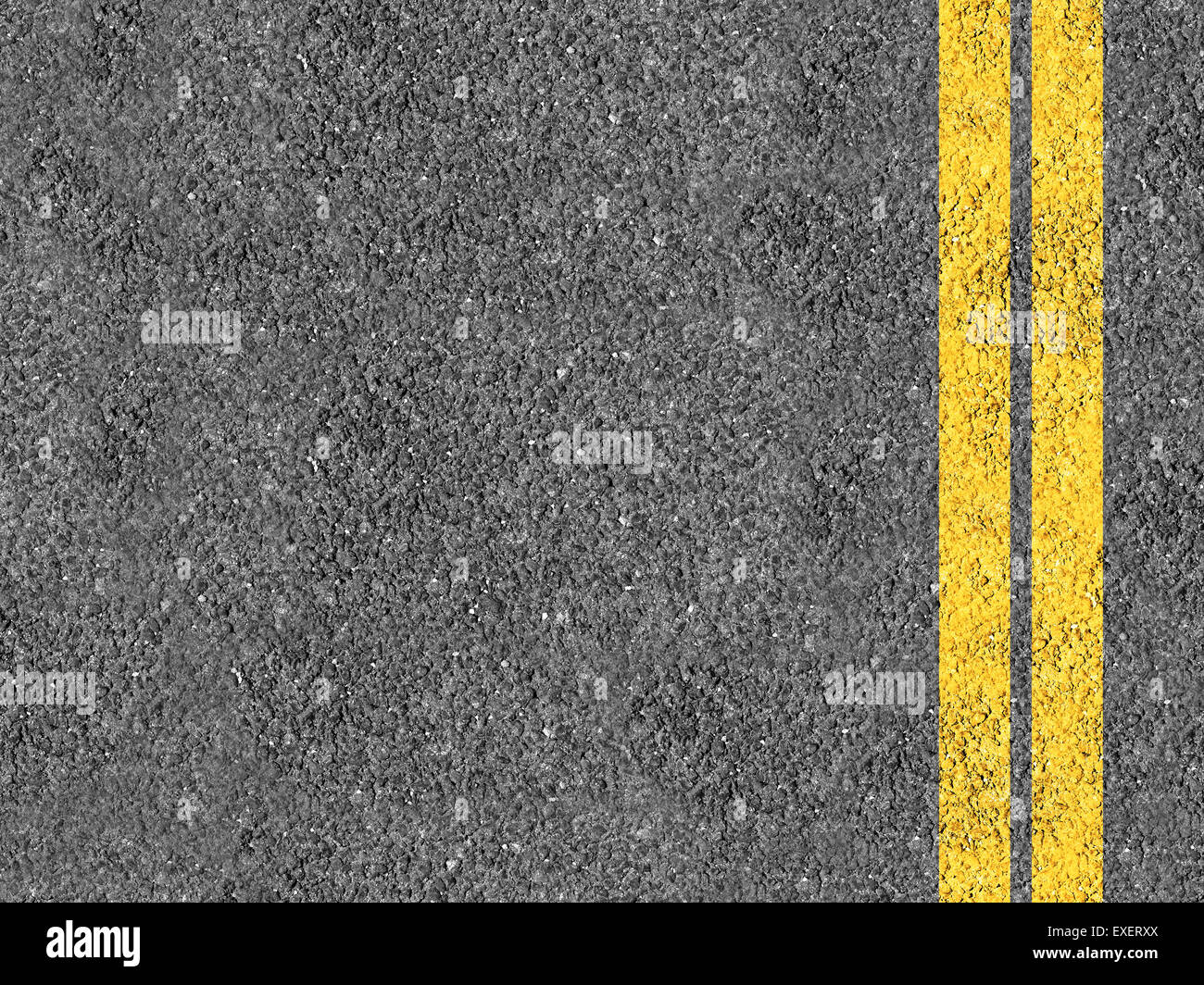 Asphalt with double yellow lines Stock Photo - Alamy
