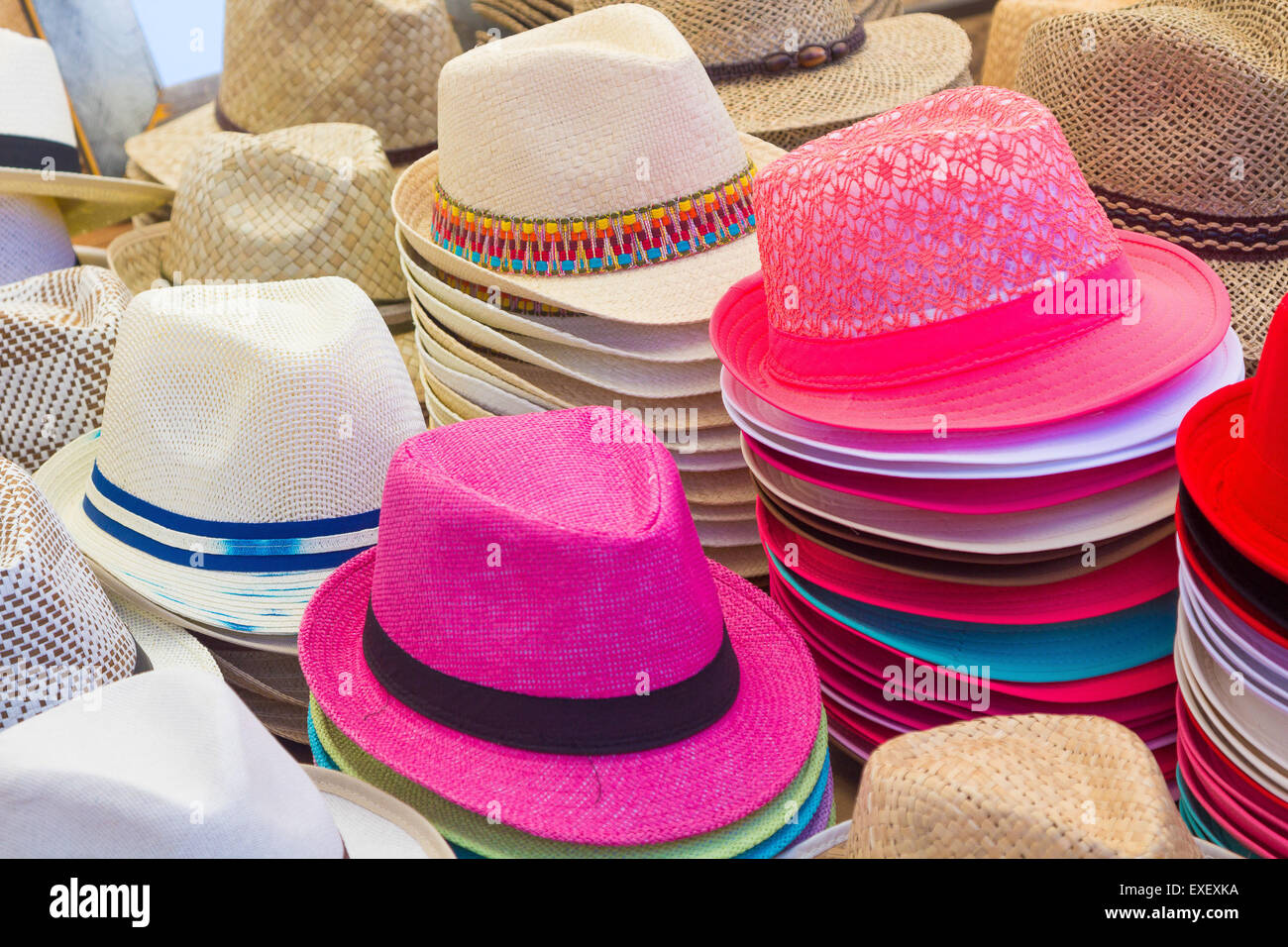 Many Hats of all colors for summer Stock Photo - Alamy