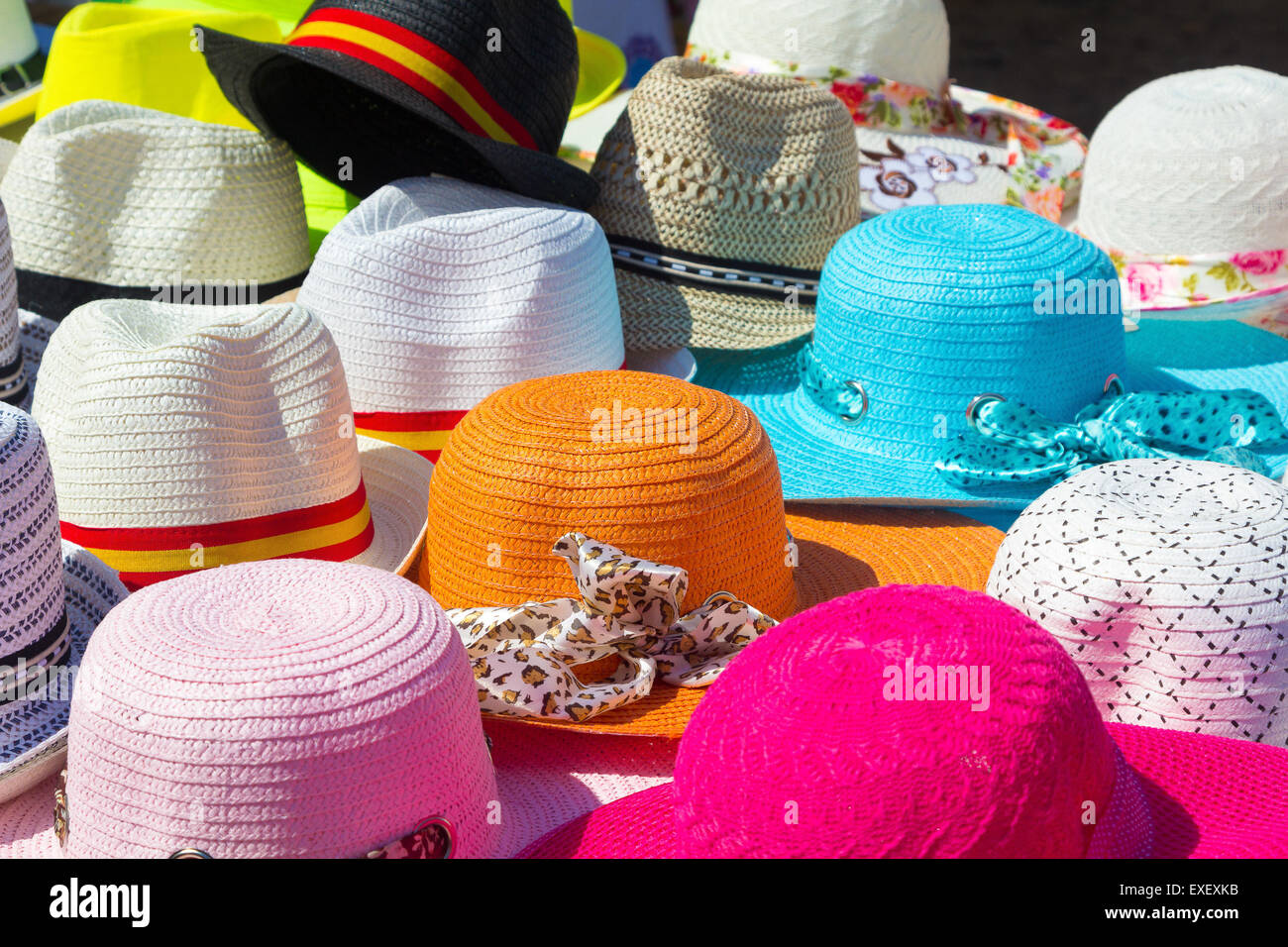 Many Hats of all colors for summer Stock Photo - Alamy
