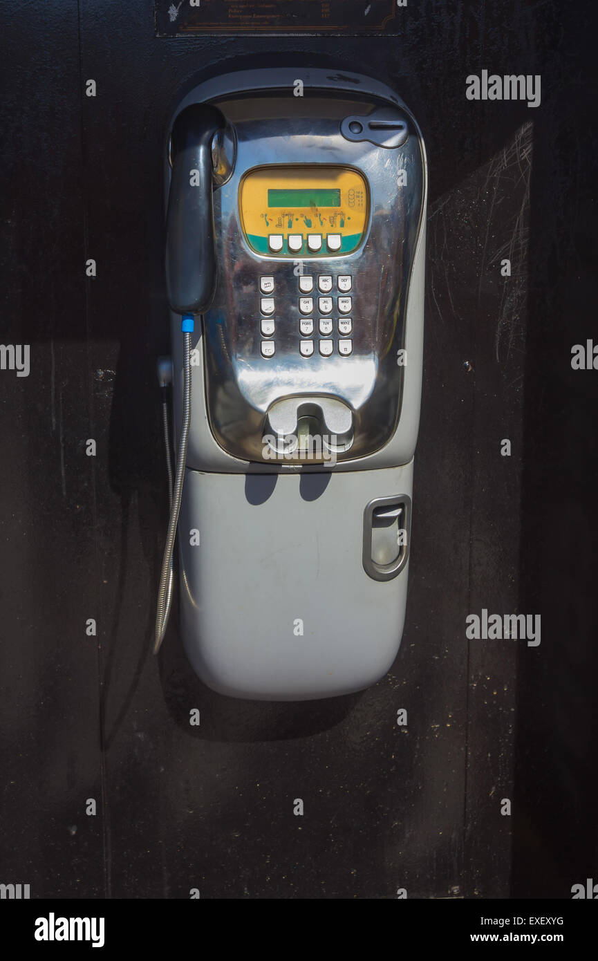 public telephone wall Stock Photo - Alamy
