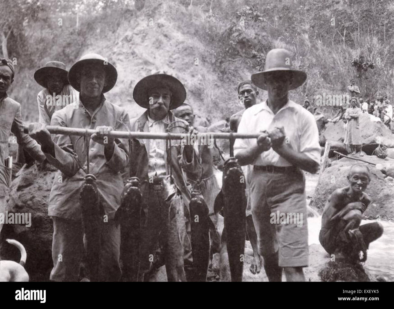 This vintage photograph shows a group of Dutch fishermen with their ...