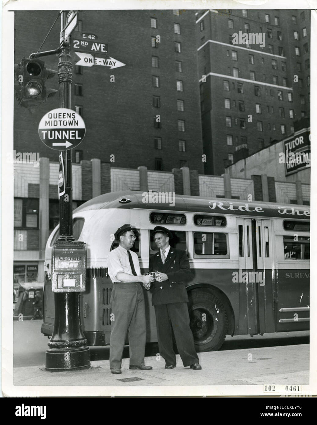 This photograph showcases a busy New York City bus in motion, capturing ...