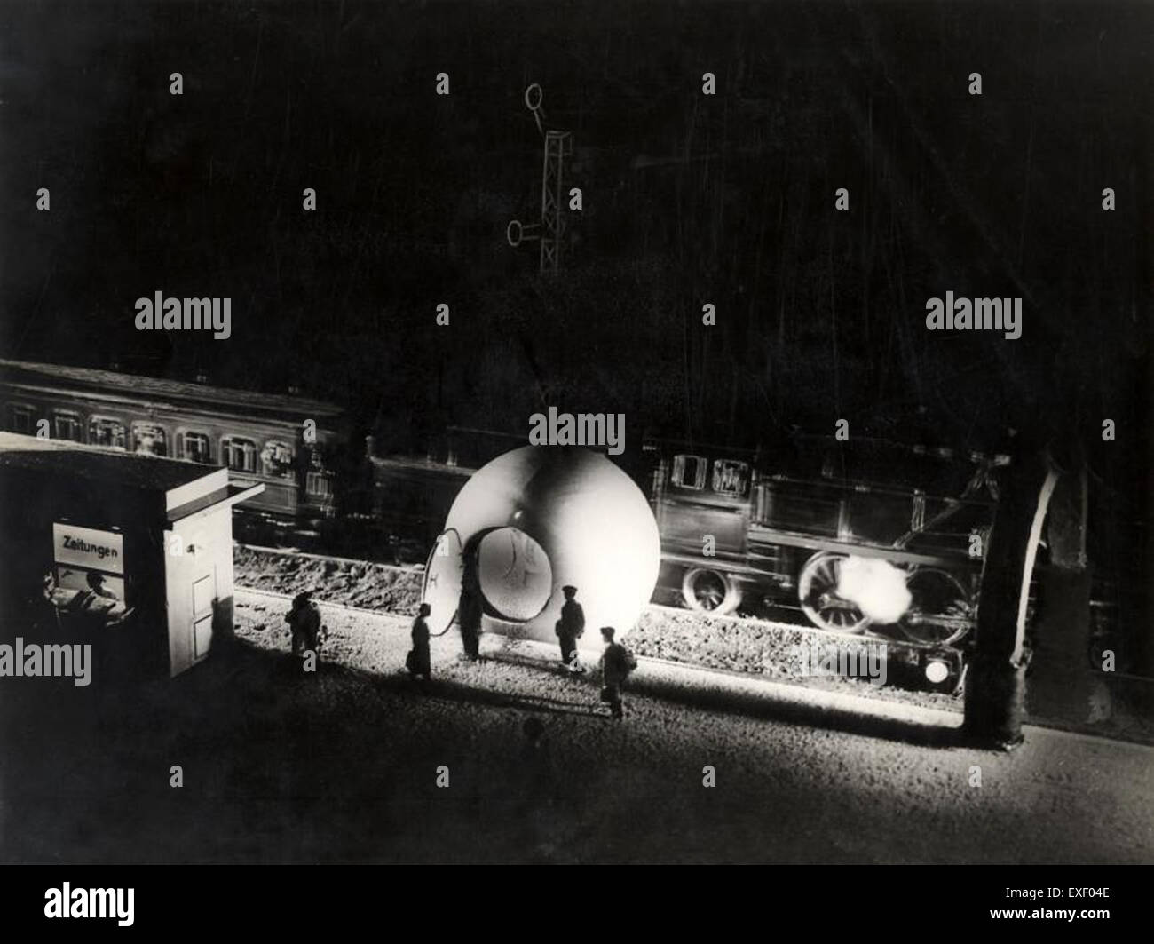 This image depicts passengers near a bullet-struck lightning train. The ...