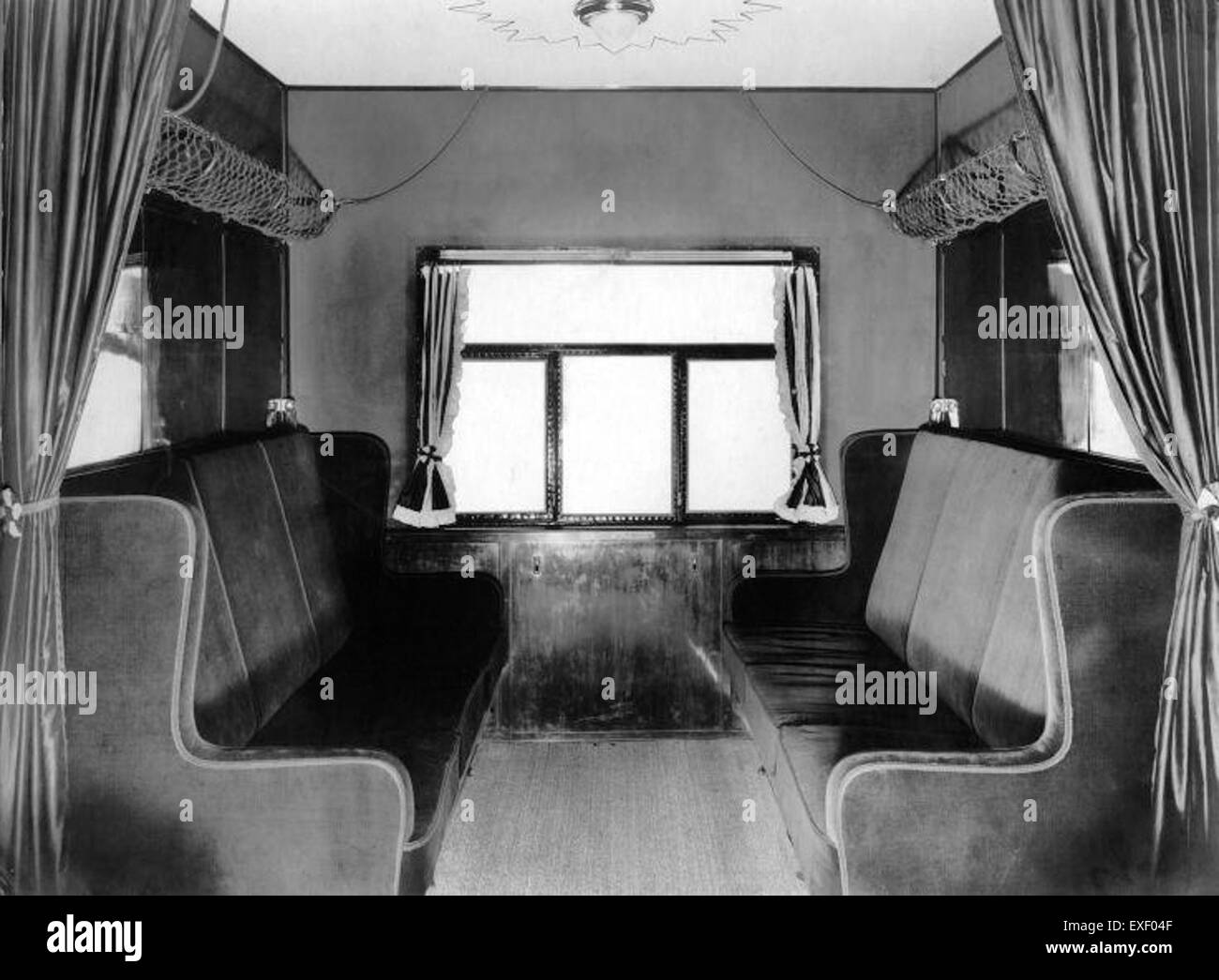 This image shows the interior of the passenger cabin of the LZ 127 Graf Zeppelin Los Angeles, a ...