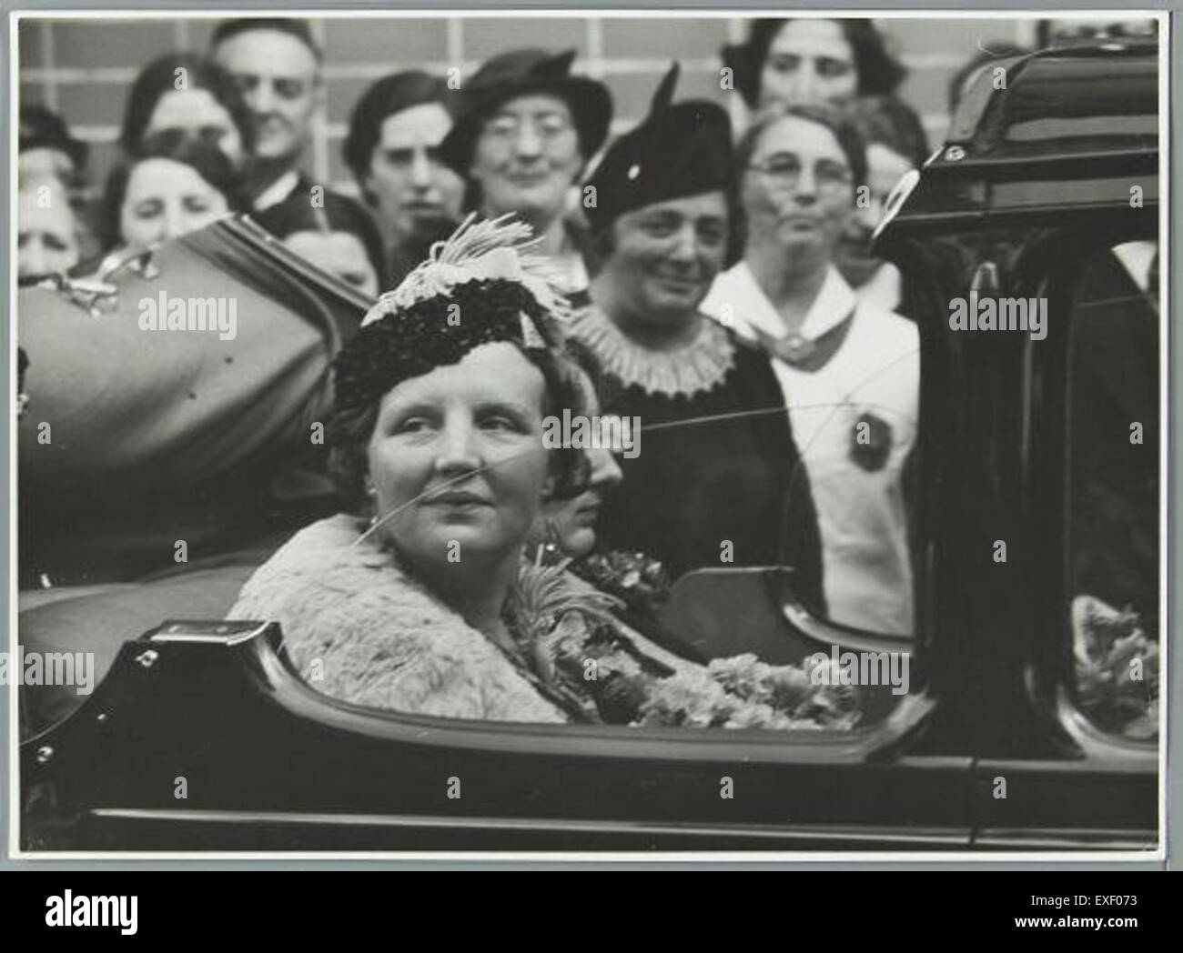The photograph shows Princess Juliana of the Netherlands visiting ...