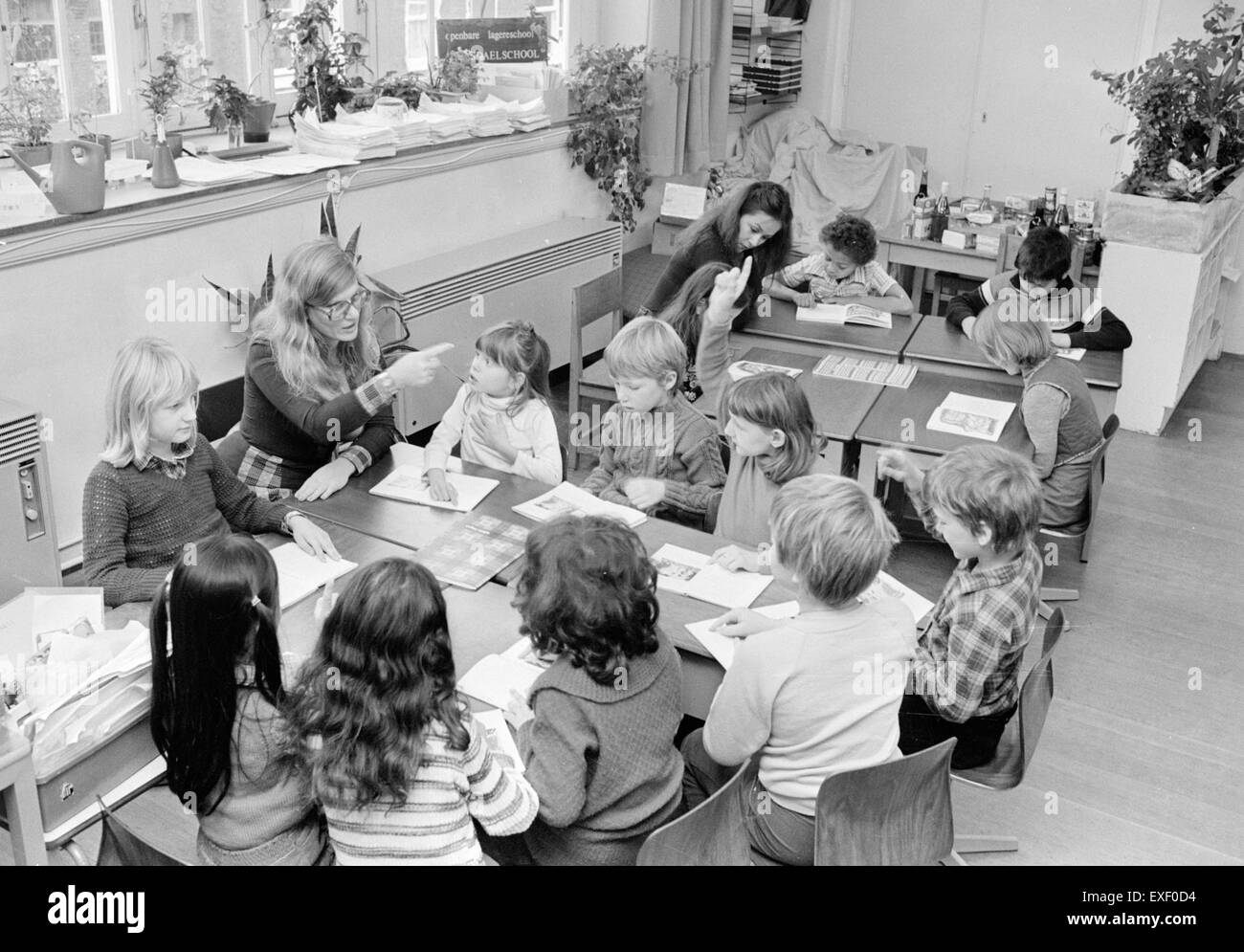 This vintage photograph captures a classroom full of students in a ...