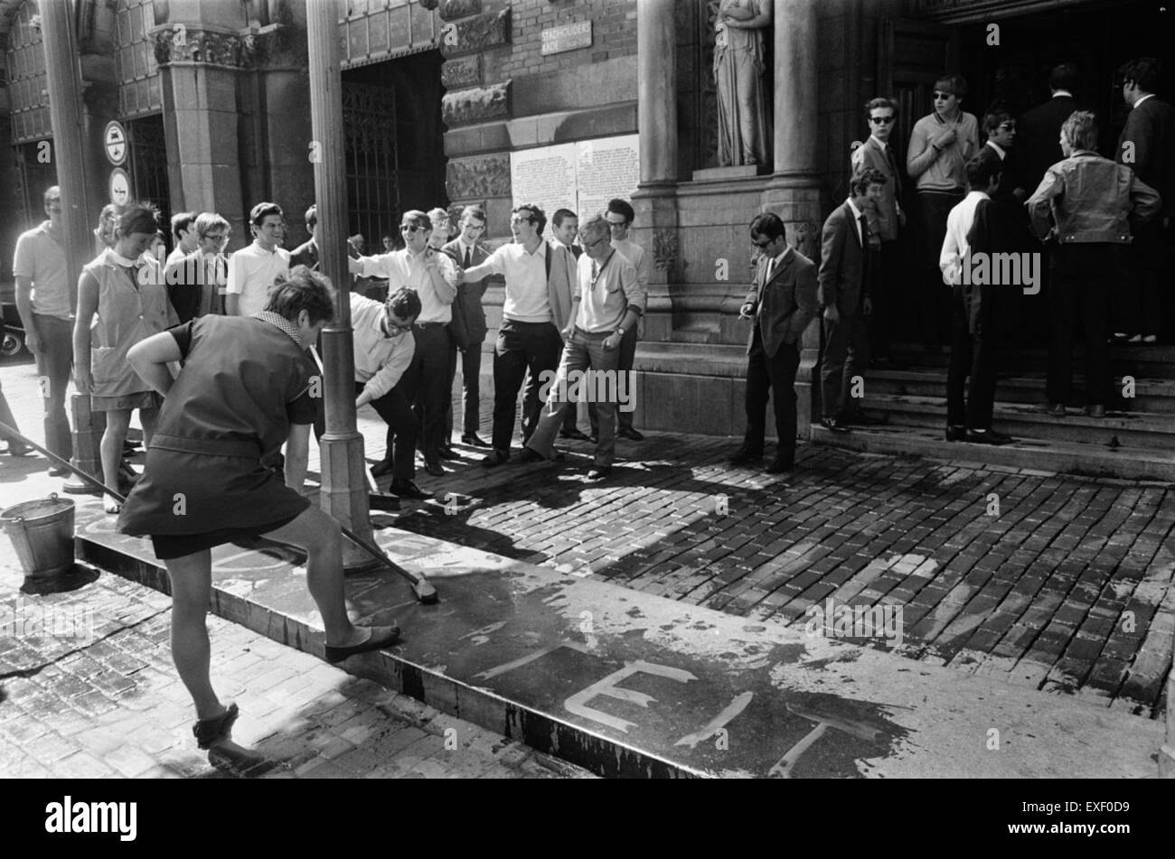 This image shows the cleaning process after artists occupied the ...