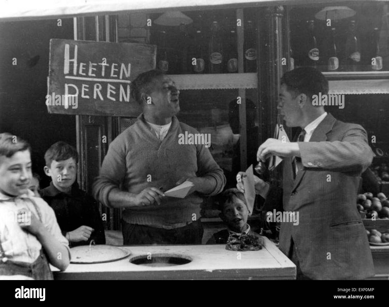 A street vendor selling pears is depicted in this artwork, capturing ...