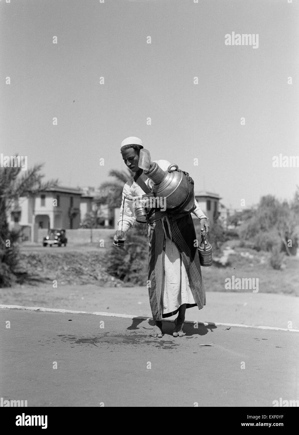 This image depicts a *peddler* serving coffee, showcasing the ...